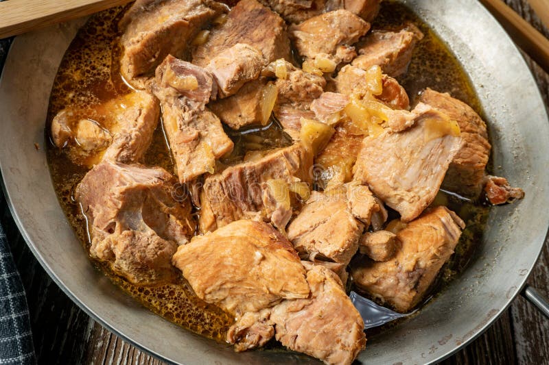 Stewed pork shoulder stock photo. Image of onion, slice - 270787550