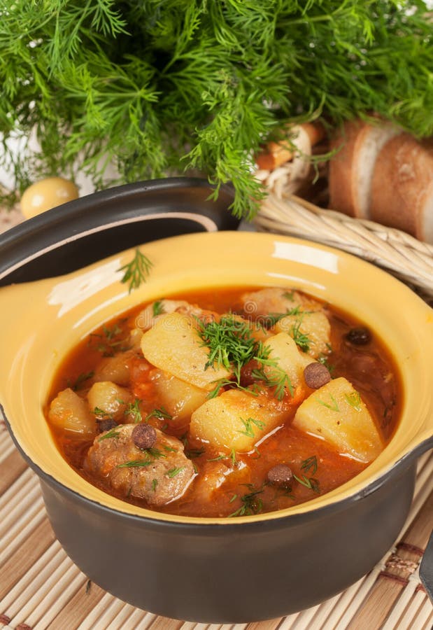 Stewed Potatoes in a Ceramic Pot. Stock Image - Image of selective ...