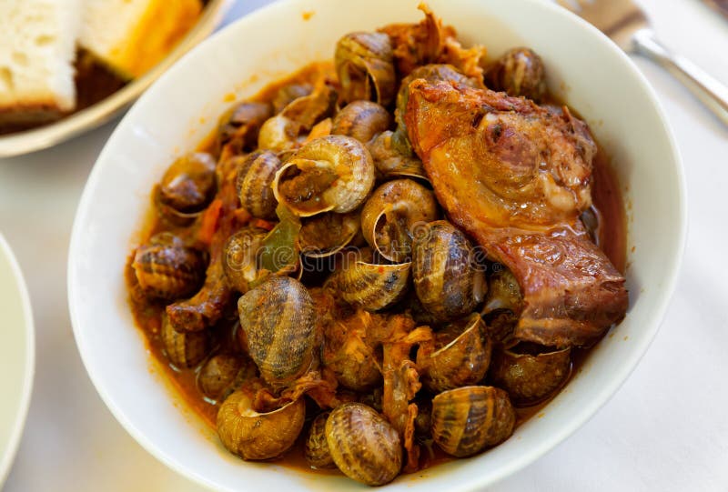 Stewed Snails with Rabbit Meat and Sausages Stock Photo - Image of ...