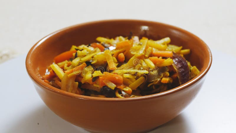 Stewed Vegetables in Spices in a Plate Rotates in a Circle Stock Video ...