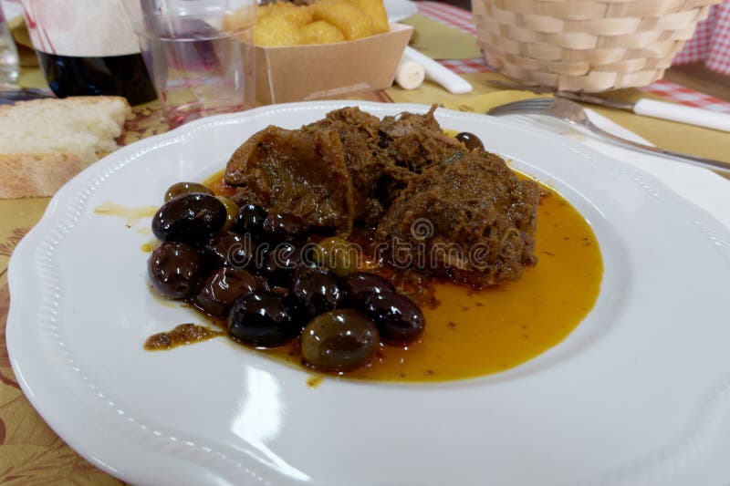 Stewed Wild Boar with Olives . Tuscan Typical Recipe Stock Photo ...
