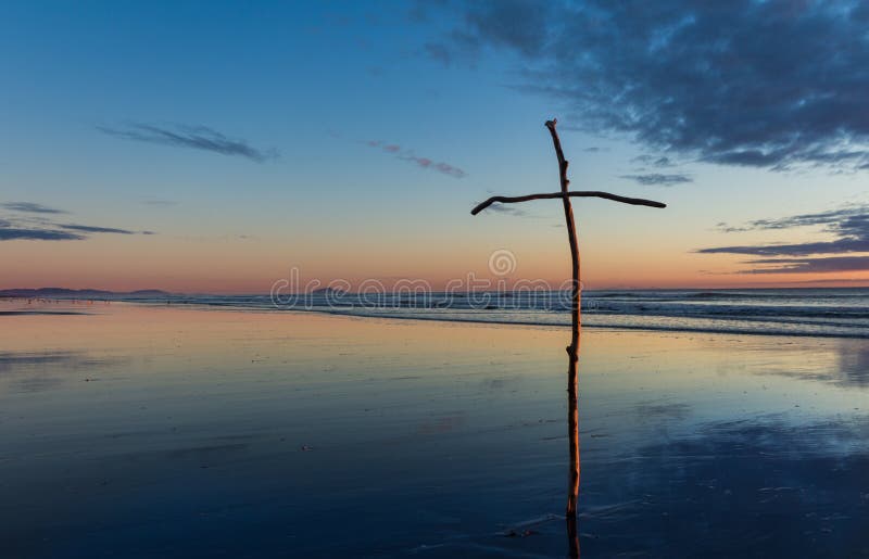 Stick Beach Cross stock photo. Image of faith, holy, clouds - 41553778