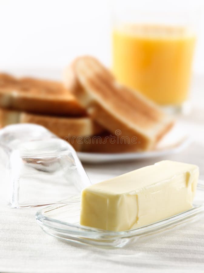 Stick of Butter at Breakfast Vertical Stock Image - Image of meal, dish ...