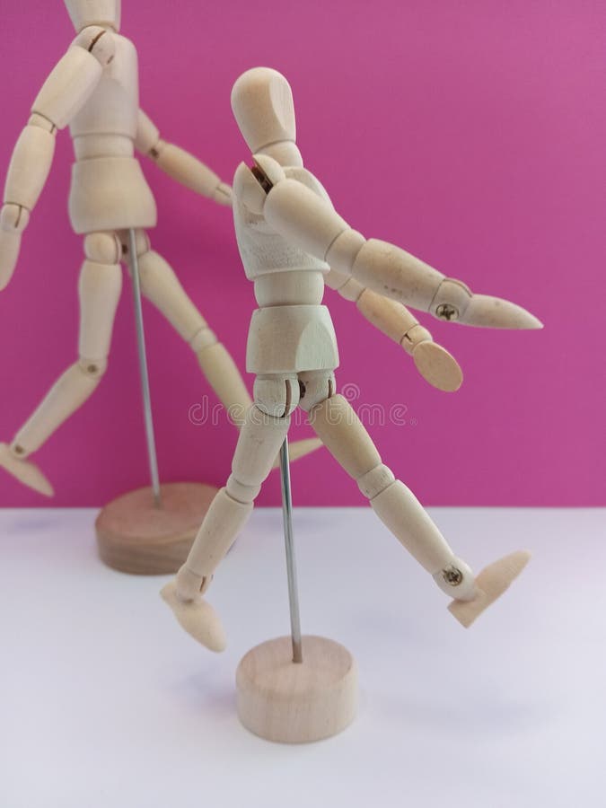 Stick People Walking with a Pink Backdrop for the Concept of Staying ...