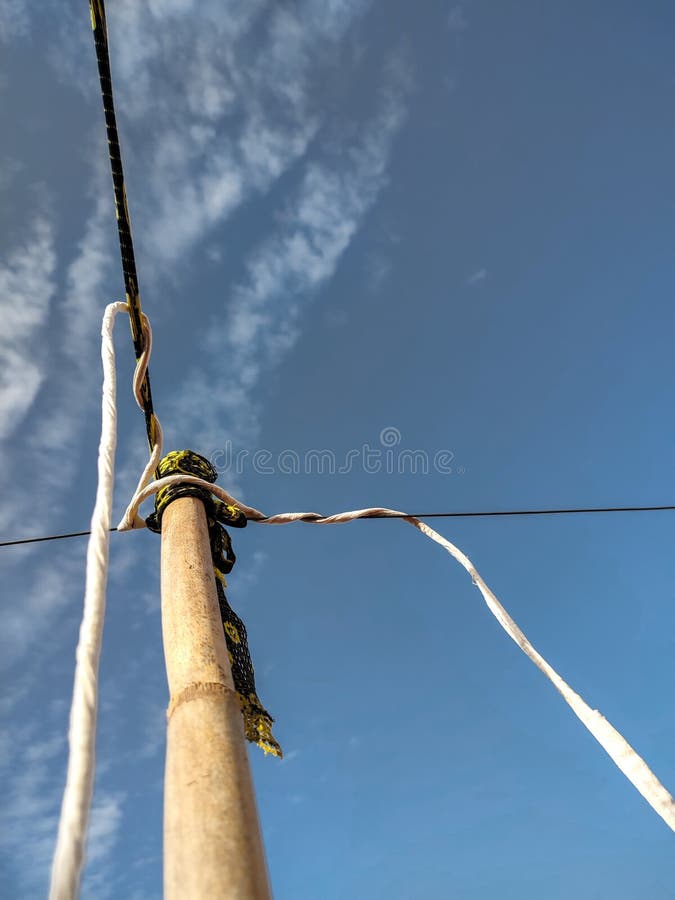 A stick with ropes stock image. Image of large, cloud - 240707487