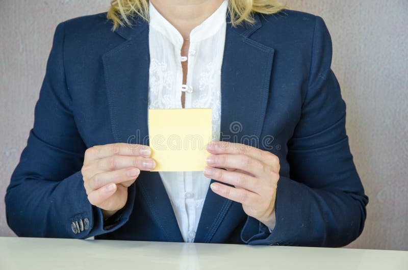 Sticker in hands stock photo. Image of office, notepaper - 55470354