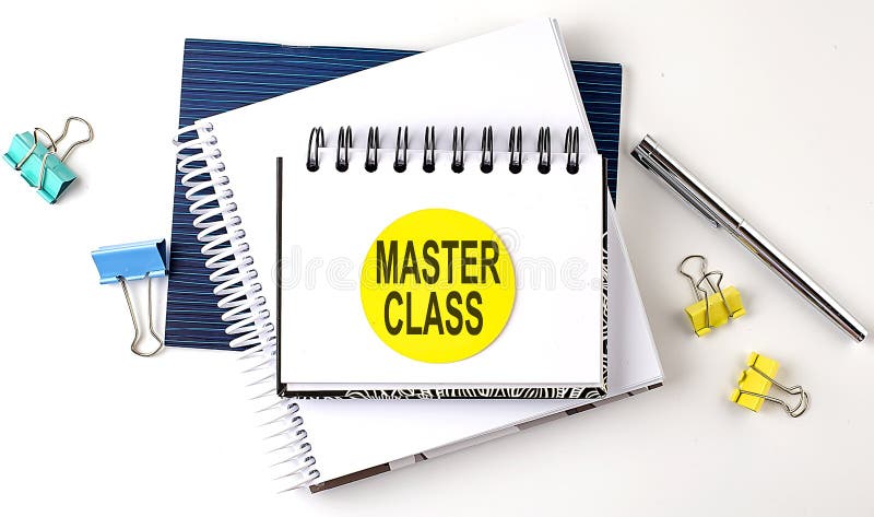 Sticker with MASTER CLASS Text on Notebooks on the White Background ...