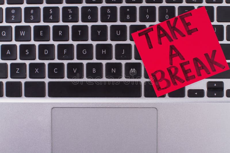 Sticker Note on Laptop Keyboard Saying Take a Break. Stock Image ...
