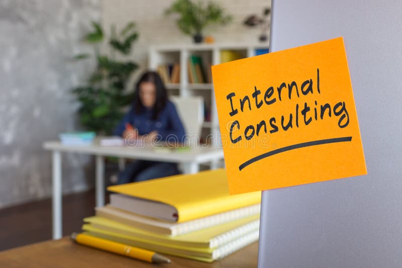 Sticker with Sign Internal Consulting on the Laptop. Stock Image ...