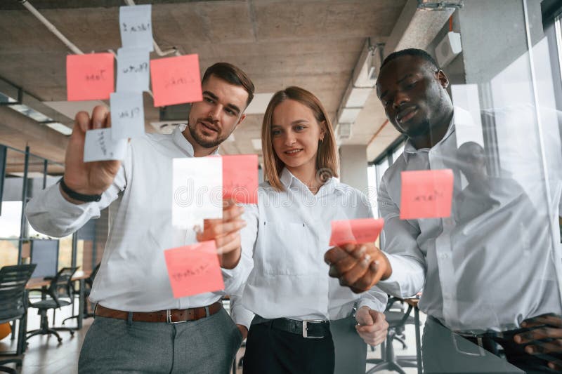 Stickers on the Glass, Planning the Project. Group of Office Workers ...