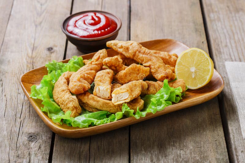 Sticks breaded chicken stock image. Image of sticks, wood - 47697907