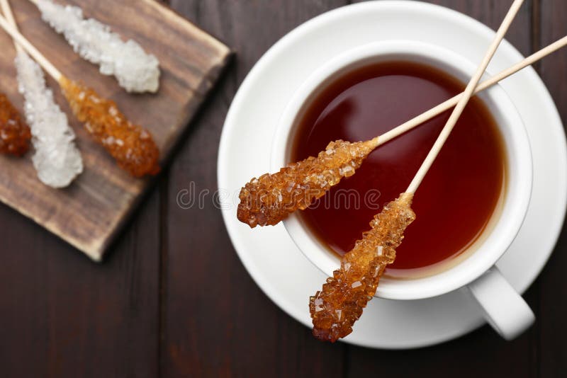 Sticks with Sugar Crystals Served To Tea on Table, Flat Lay Stock Image ...
