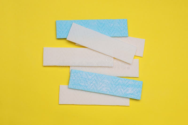 Sticks of Tasty Chewing Gum on Yellow Background, Flat Lay Stock Photo ...