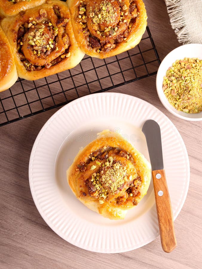Sticky buns with pistachio stock photo. Image of sweet - 298673782