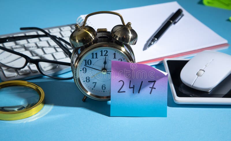24 7 on Sticky Note with a Alarm Clock and Business Objects Stock Photo ...