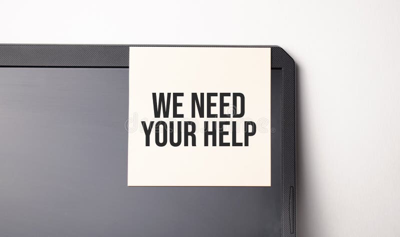 Sticky Note on the Computer. Text we Need Your Help Stock Photo - Image ...