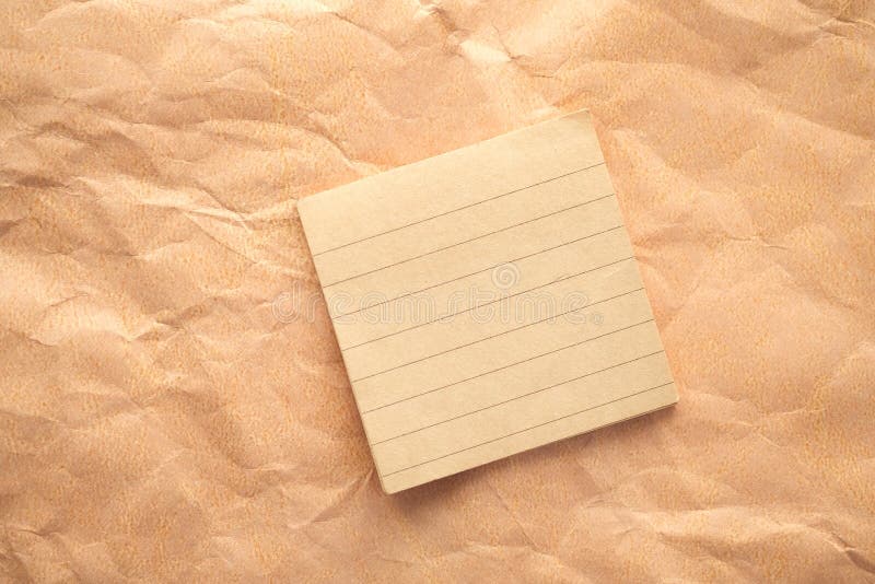 A Sticky Note on Crumpled Paper Stock Photo - Image of note, isolated ...