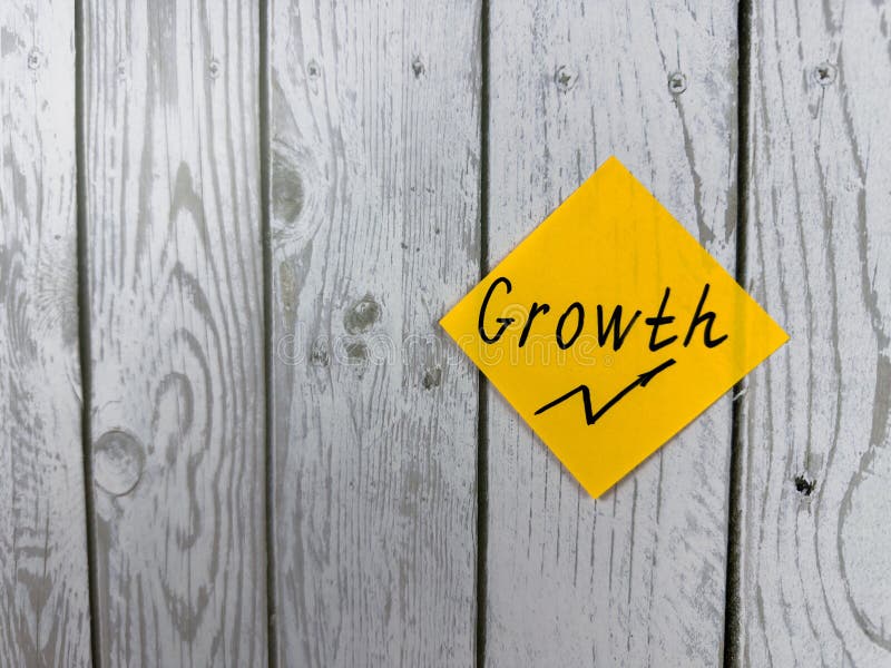 Sticky Note Displaying the Word Growth Against Backdrop of Textured ...