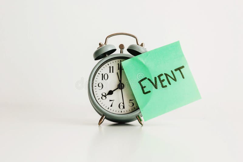 Sticky Note with EVENT Attached To an Alarm Clock Stock Image - Image ...