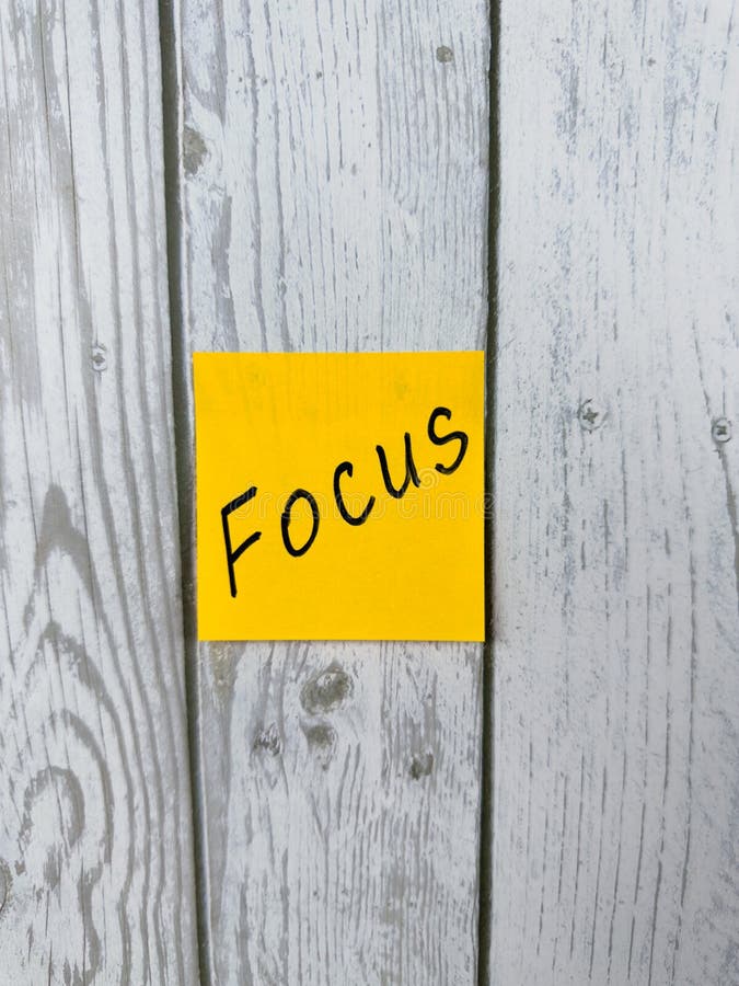Sticky Note with Focus Written on it, Placed on White Wooden Board ...
