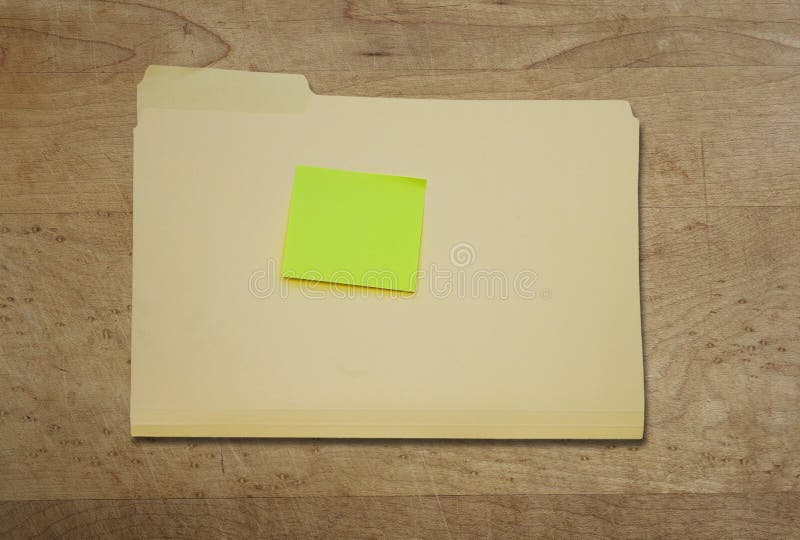 Sticky note on folder stock photo. Image of blank, empty - 154793652