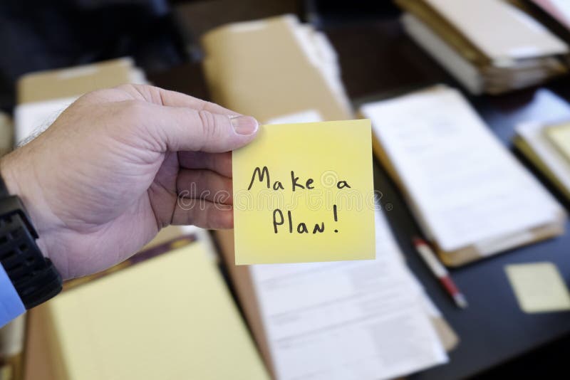 Sticky Note in Hand Businessman Desk Files Folder Working Make a Plan ...