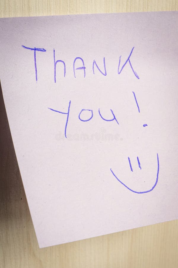 A Sticky Note Hanging on the Wall, with the Text Thank You on it Stock ...