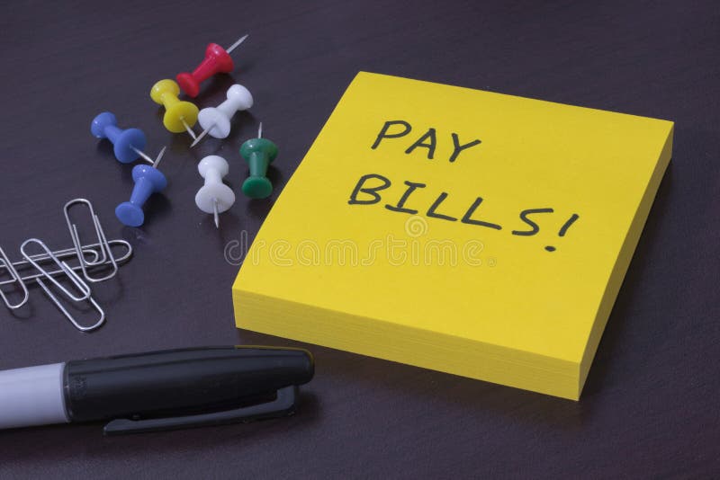 Sticky Note Pad with the Reminder To Pay Bills Stock Photo - Image of ...
