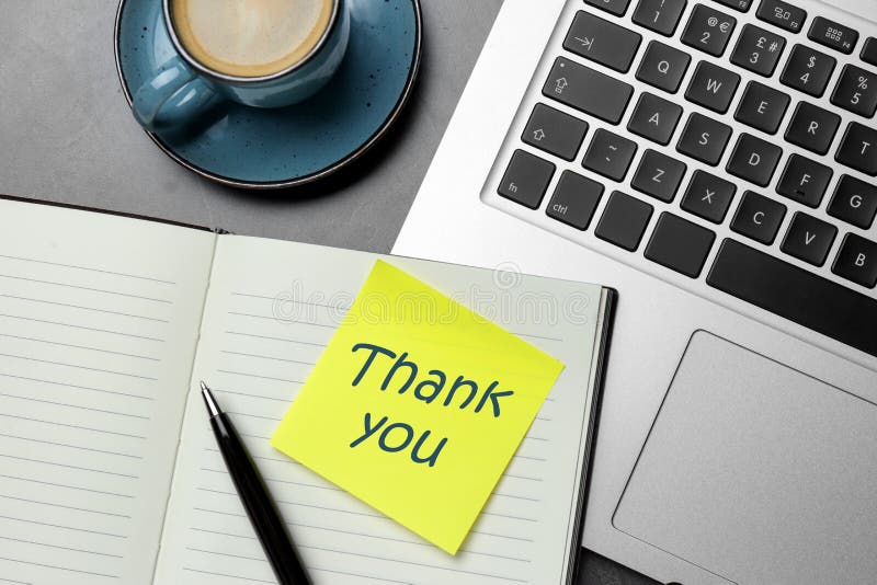 Sticky Note with Phrase Thank You, Notebook, Laptop, Pen and Cup of ...