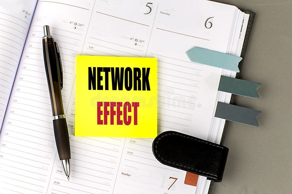 Sticky Note with the Text Network Effect Placed on a Planner, Next To a ...