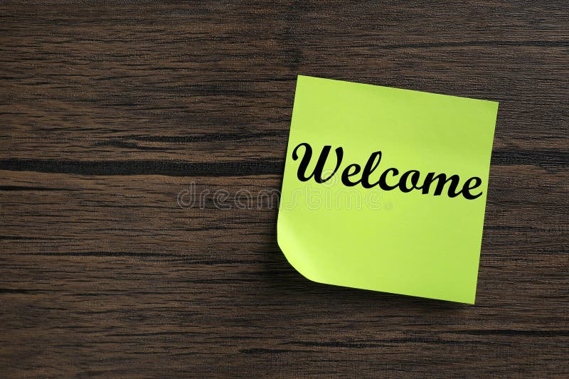 Sticky Note with Word Welcome on Wooden Table, Top View. Space for Text ...