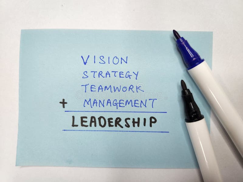 A Sticky Note with Words Vision, Strategy, Teamwork, Management and ...