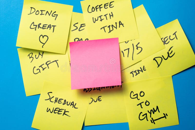 Sticky Notes on a Blue Wall with Blank Pink Note Stock Photo - Image of ...