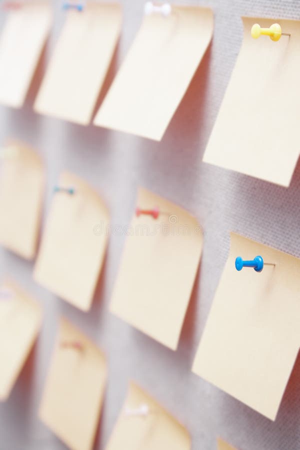 Sticky Notes on a Bulletin Board Stock Photo - Image of stationary ...