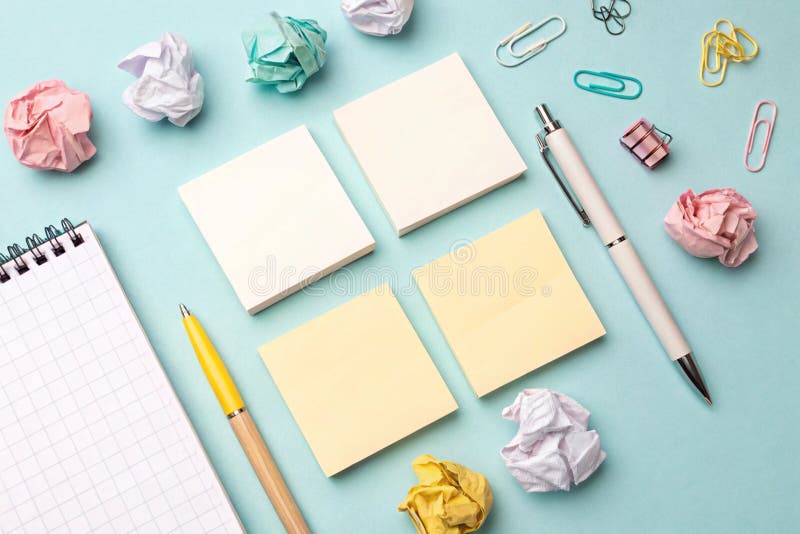 Sticky Notes with Crumbled Paper Balls on Pastel Background Stock ...