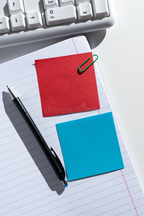 Sticky Notes with Important Messages Clipped on Opened Notebook on Desk ...