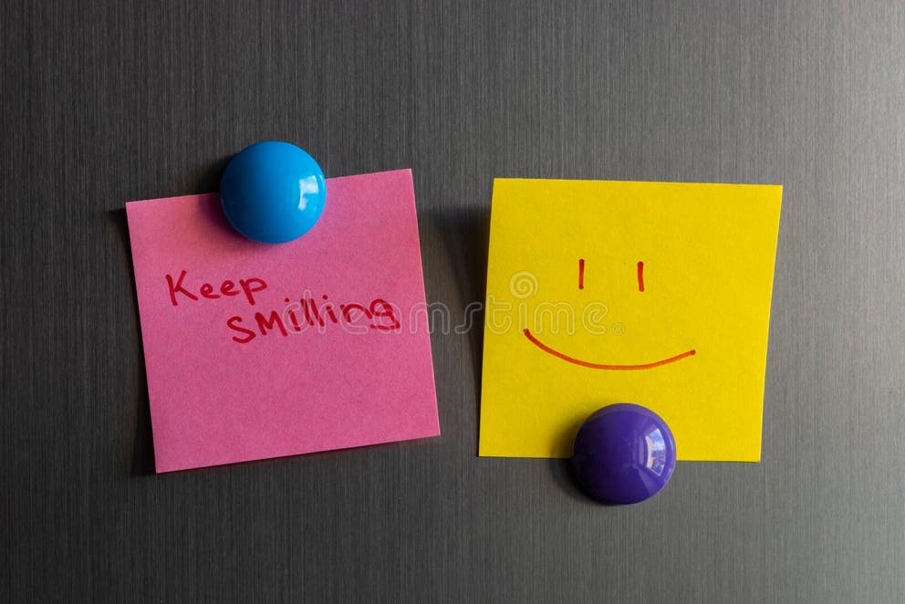 Sticky Notes Keep Smiling and Smiley Magnet Attached To the ...