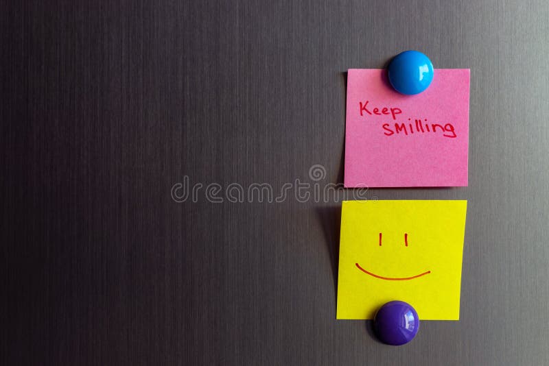 Sticky Notes Keep Smiling and Smiley Magnet Attached To the ...