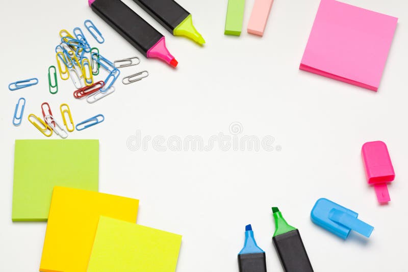 Sticky Notes with Markers, Colored Pens, Paper Clips Laying on a Table ...