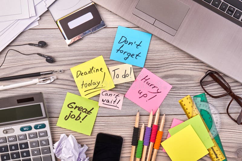 Sticky Notes with Motivative Messages on the Office Work Desk. Stock ...