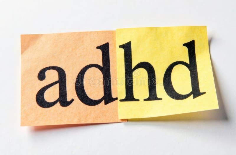 Sticky Notes in Orange and Yellow Showcase the Acronym ADHD Stock Photo ...