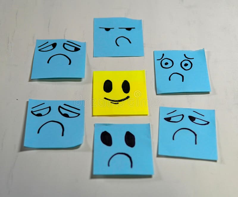 Sticky Notes with Sad Faces Surround a Single Yellow Note with a Smiley ...