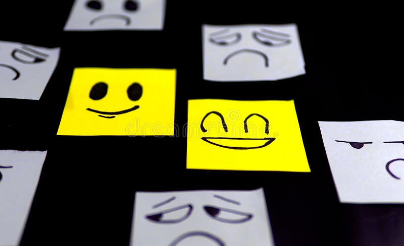 Sticky Notes with Sad Faces Surround Two Yellow Notes with Smiley Faces ...