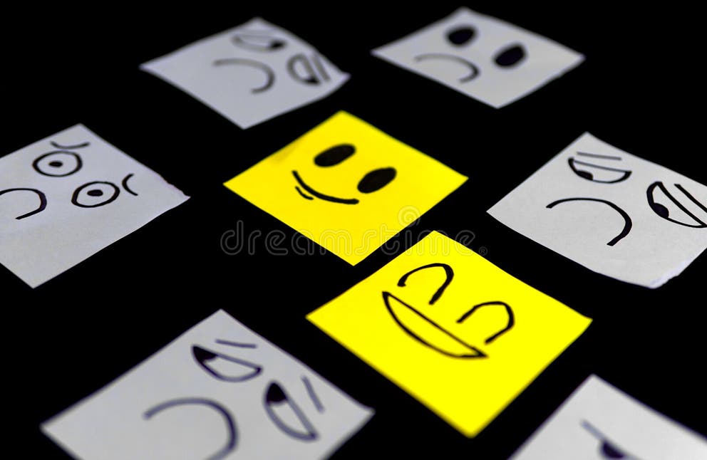 Sticky Notes with Sad Faces Surround Two Yellow Notes with Smiley Faces ...