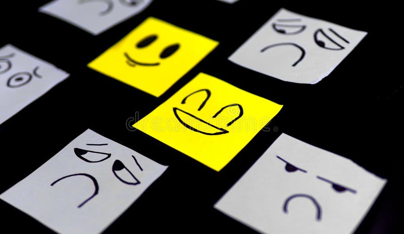 Sticky Notes with Sad Faces Surround Two Yellow Notes with Smiley Faces ...