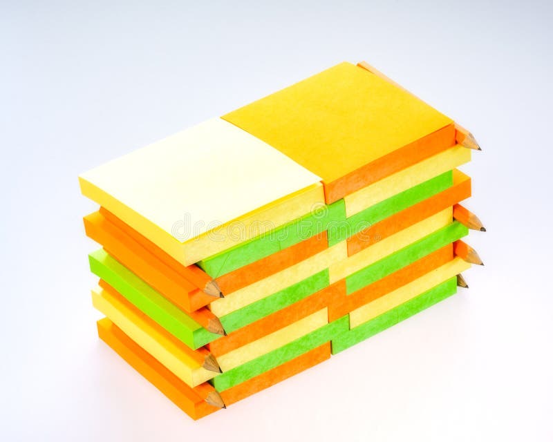 Sticky Notes Stacked in a Pattern with Little Pencils Stock Image ...