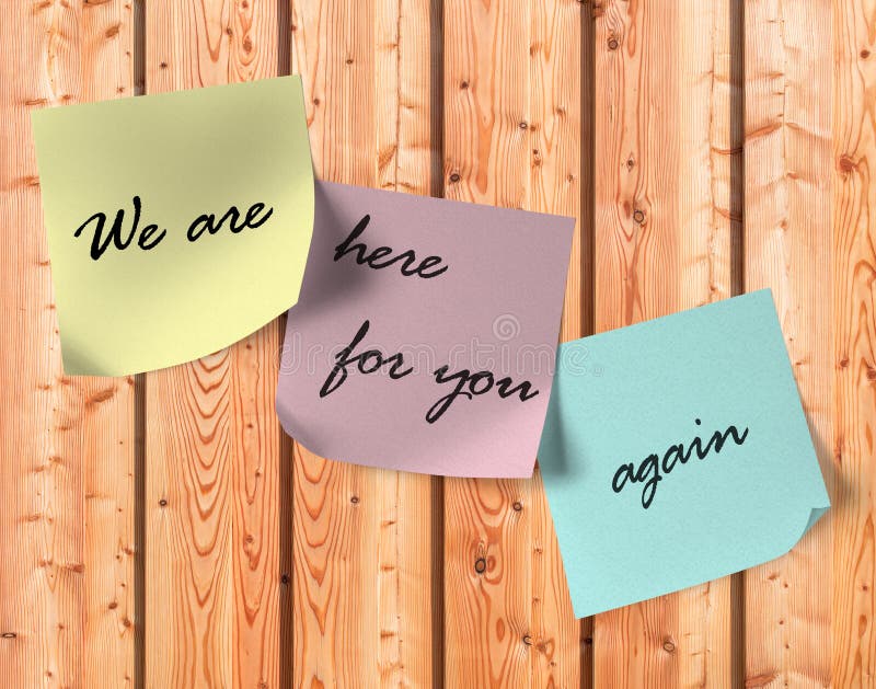 Sticky Notes with the Text "we are Here for You Again" on a Wooden Wall ...