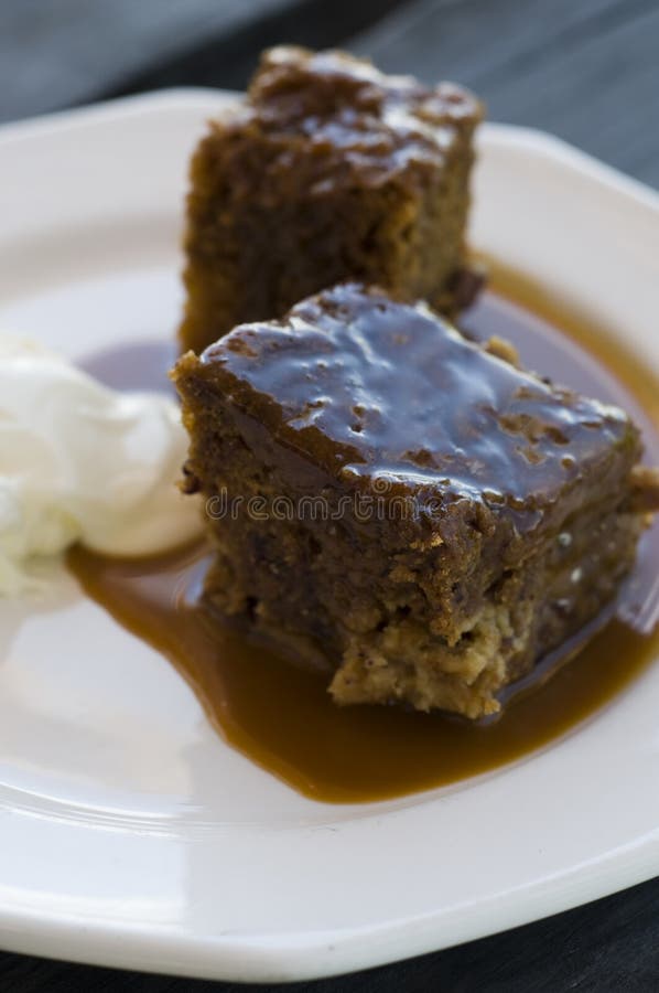 Closeup of English Toffee Pudding Topped with Vanilla Whipped Cream ...