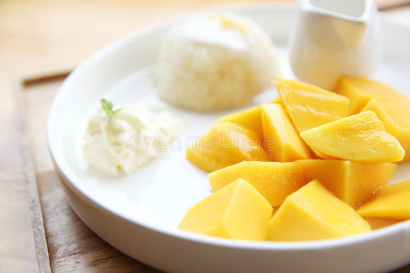 Sticky Rice with Mango on Wooden Plate Stock Photo - Image of asia ...