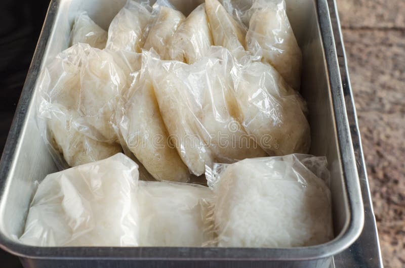 Sticky Rice Pack in Plastic Wrap Stock Photo - Image of asian, meal ...
